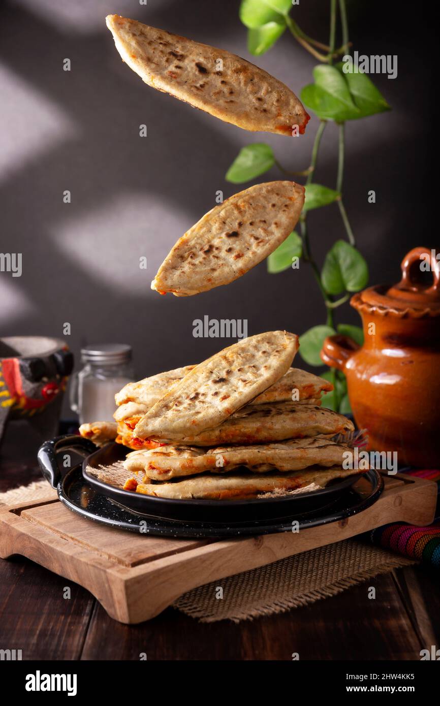 Tlacoyos. Mexican pre hispanic dish made of corn flour patty filled ...