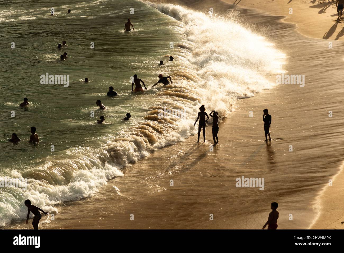 Large group of people on Paciencia beach in the Rio Vermelho ...