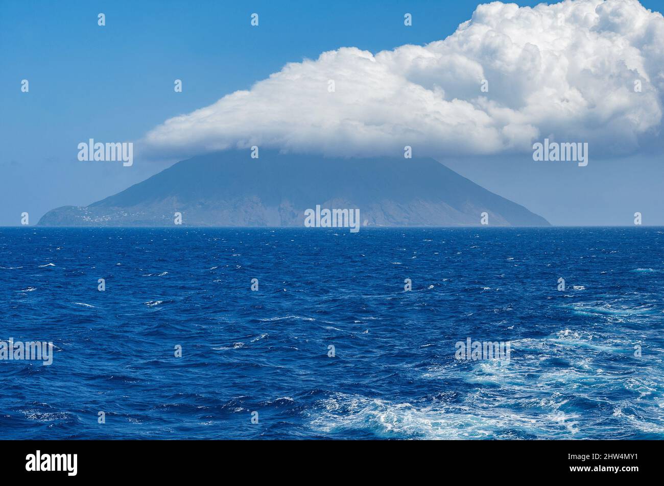 Stromboli island with cloud on the top. Italy Stock Photo - Alamy