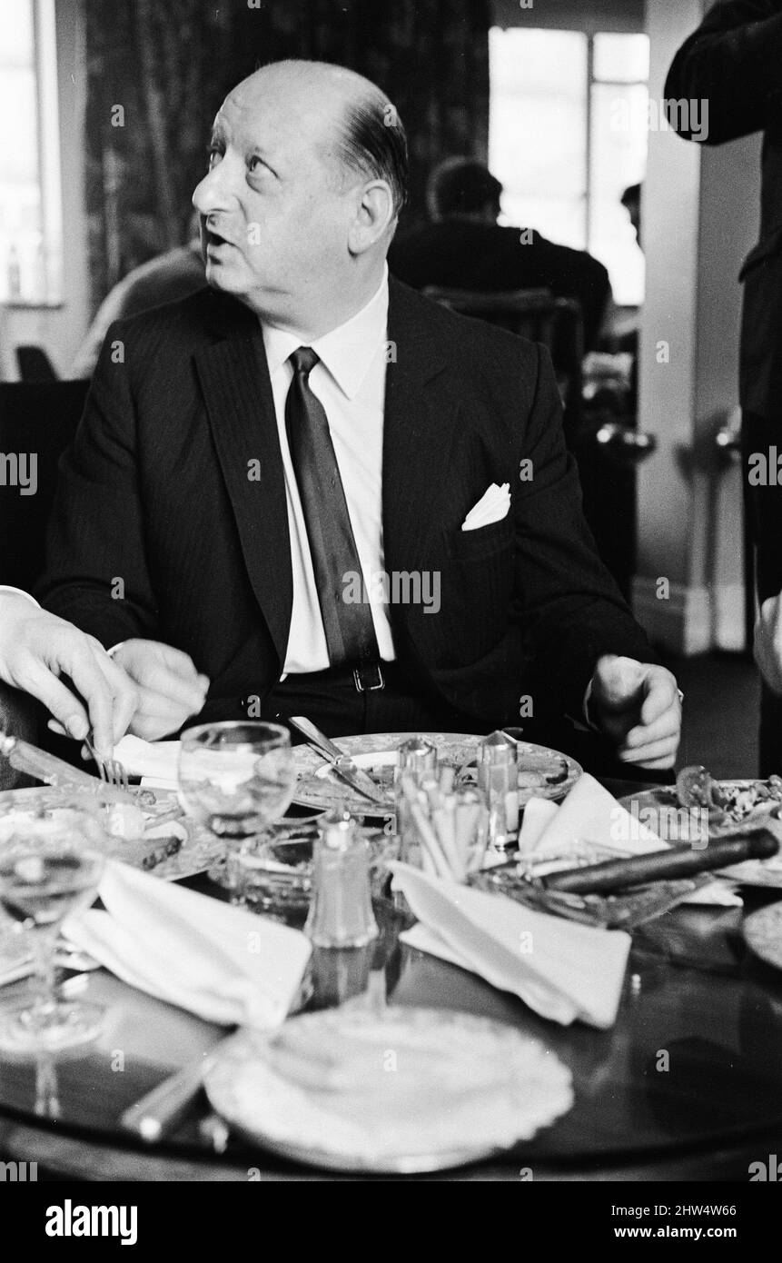 Media Mogul Lord Lew Grade seated at the table at a dinner party. 24th ...
