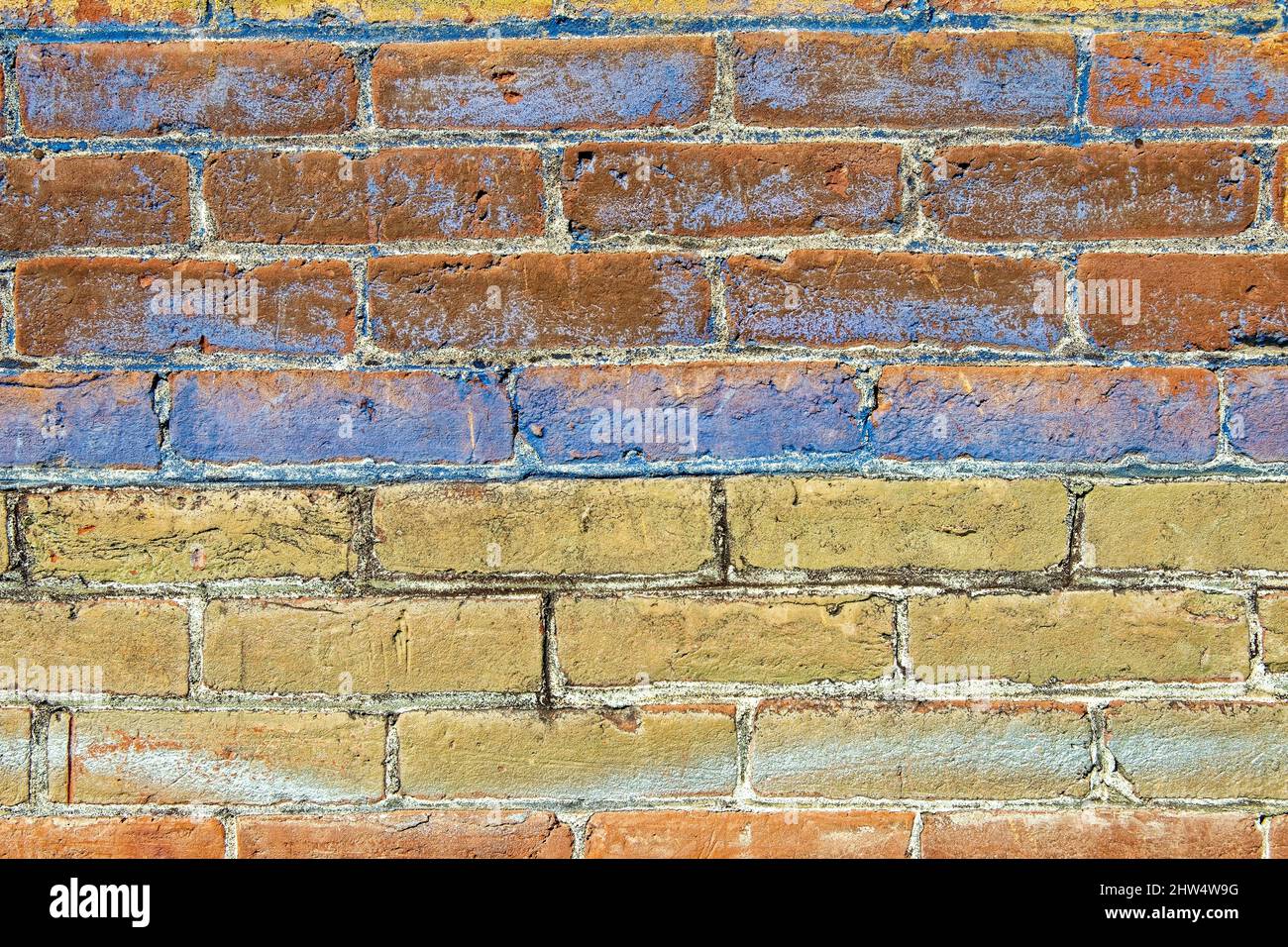Detail of brick wall with fading paint Stock Photo - Alamy