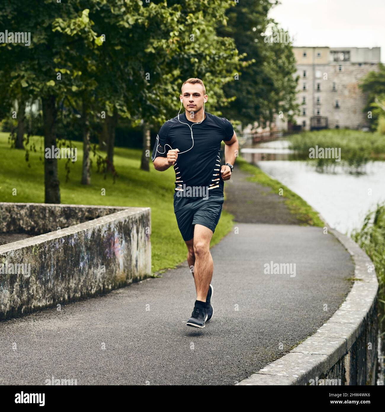 Youre every step closer to your goals. Shot of a sporty young man ...