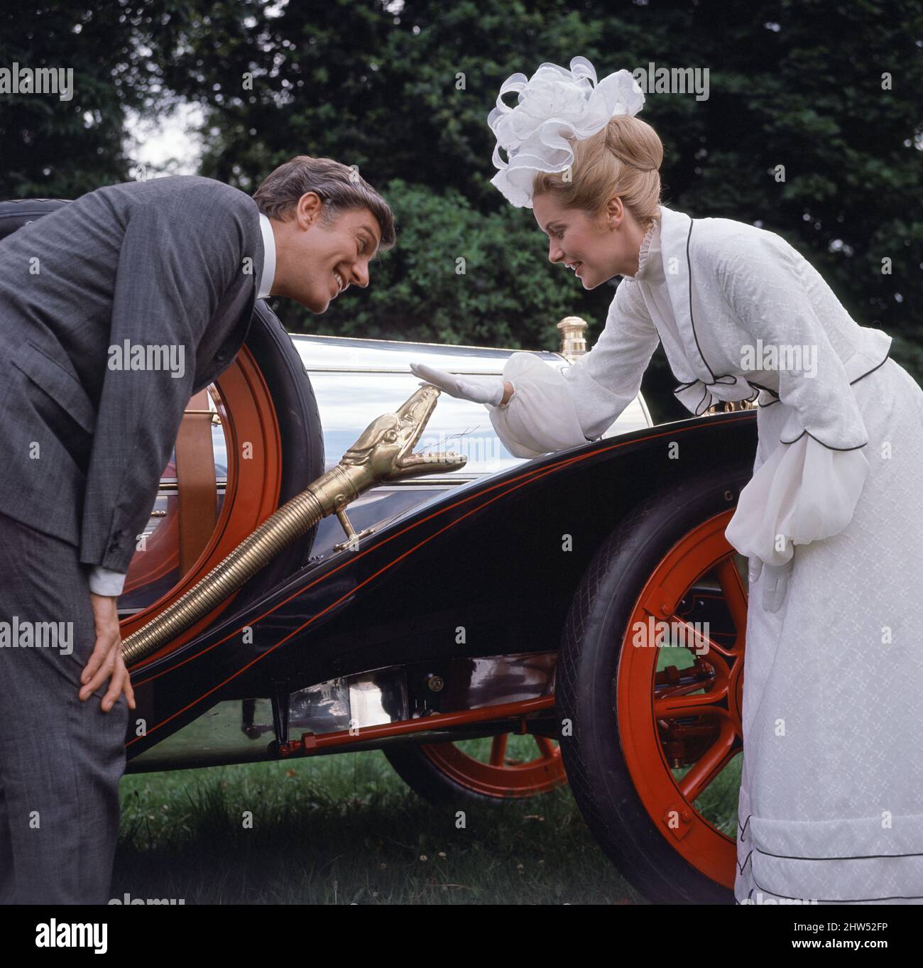 American actor Dick van Dyke and actress Ann Howes with the car which ...
