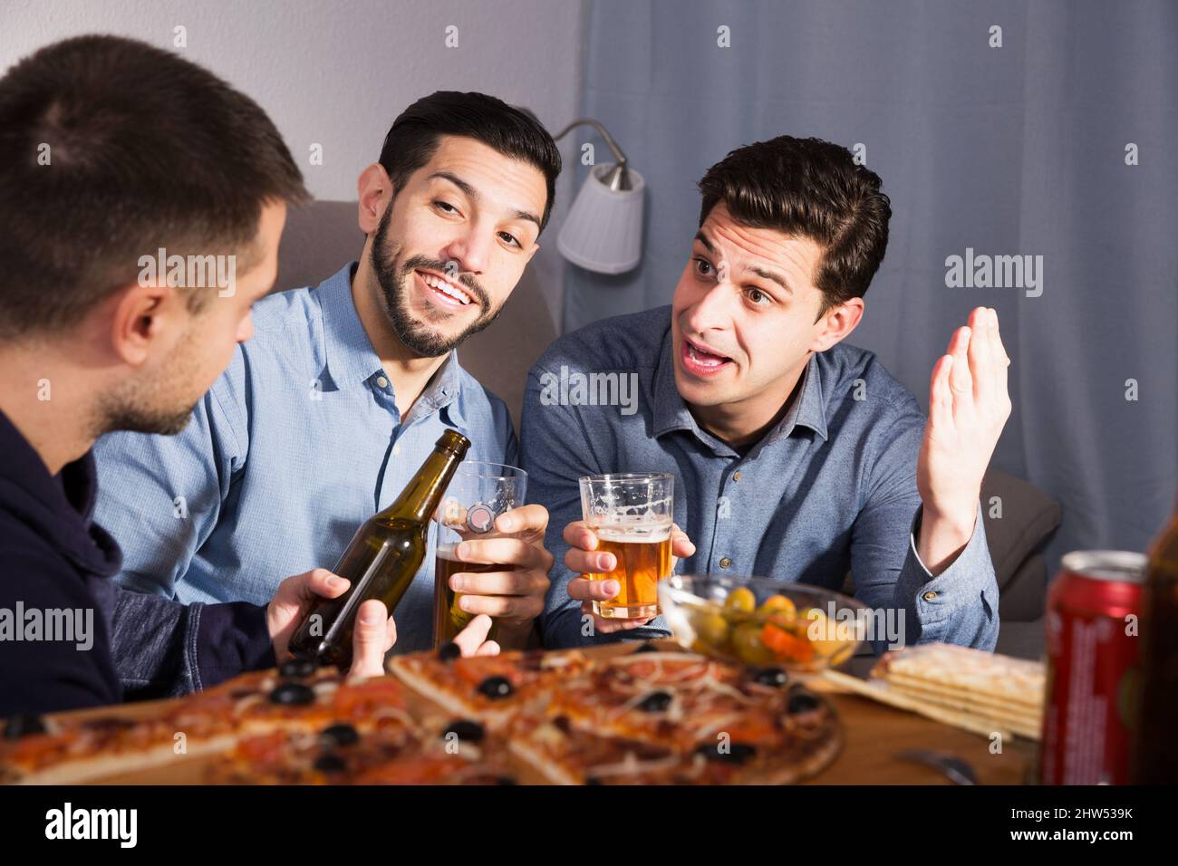 Three laughing guys hi-res stock photography and images - Alamy
