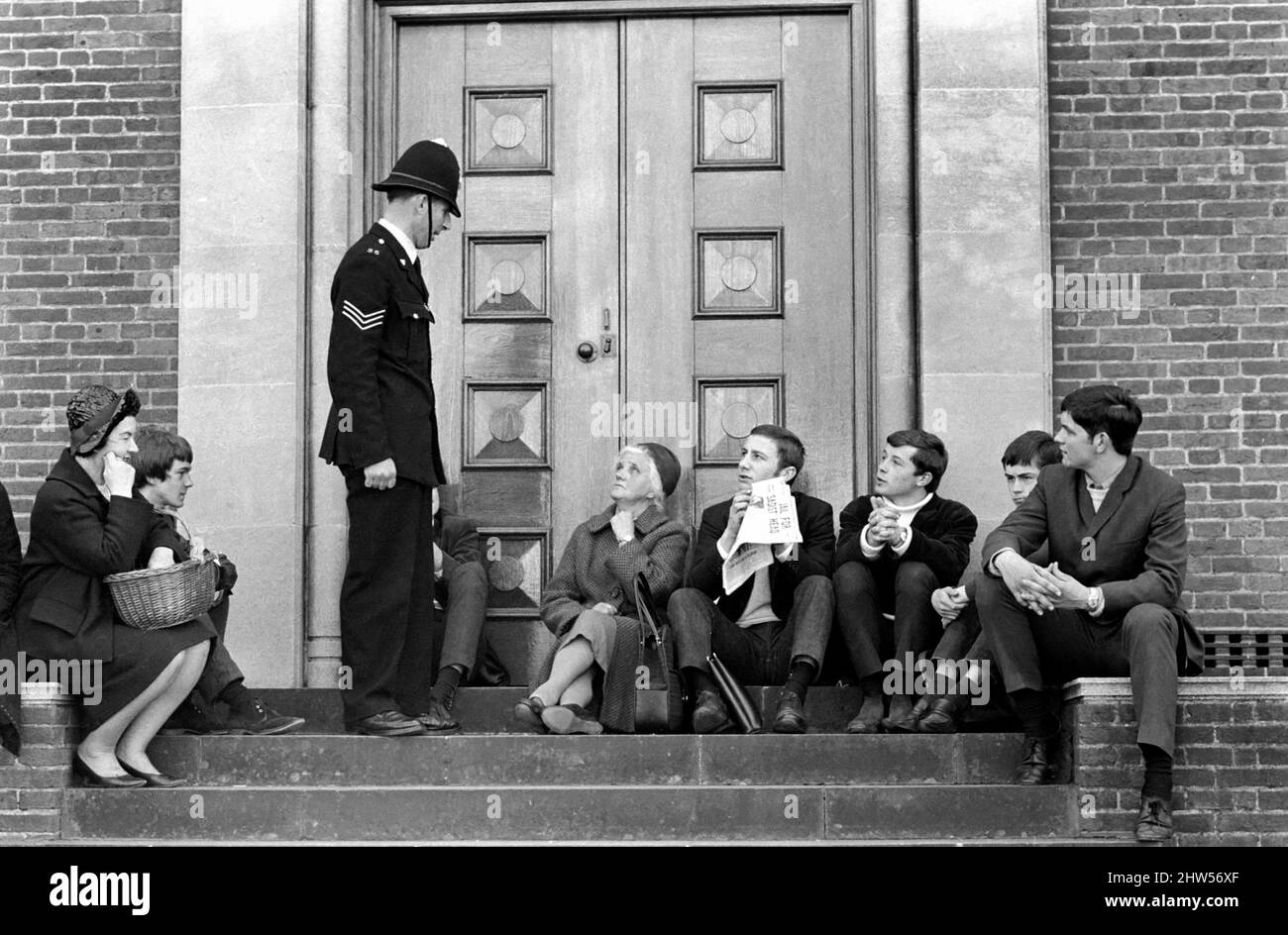 Members of the public waiting to go into court to see Mick Jagger and ...