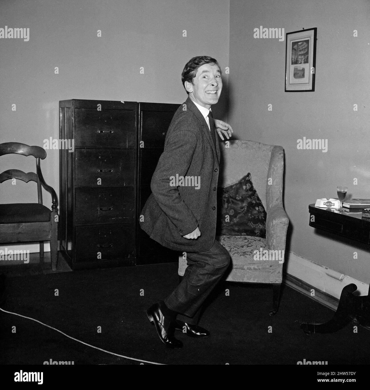 Kenneth Williams pictured in his agent's office in Cork Street, London ...