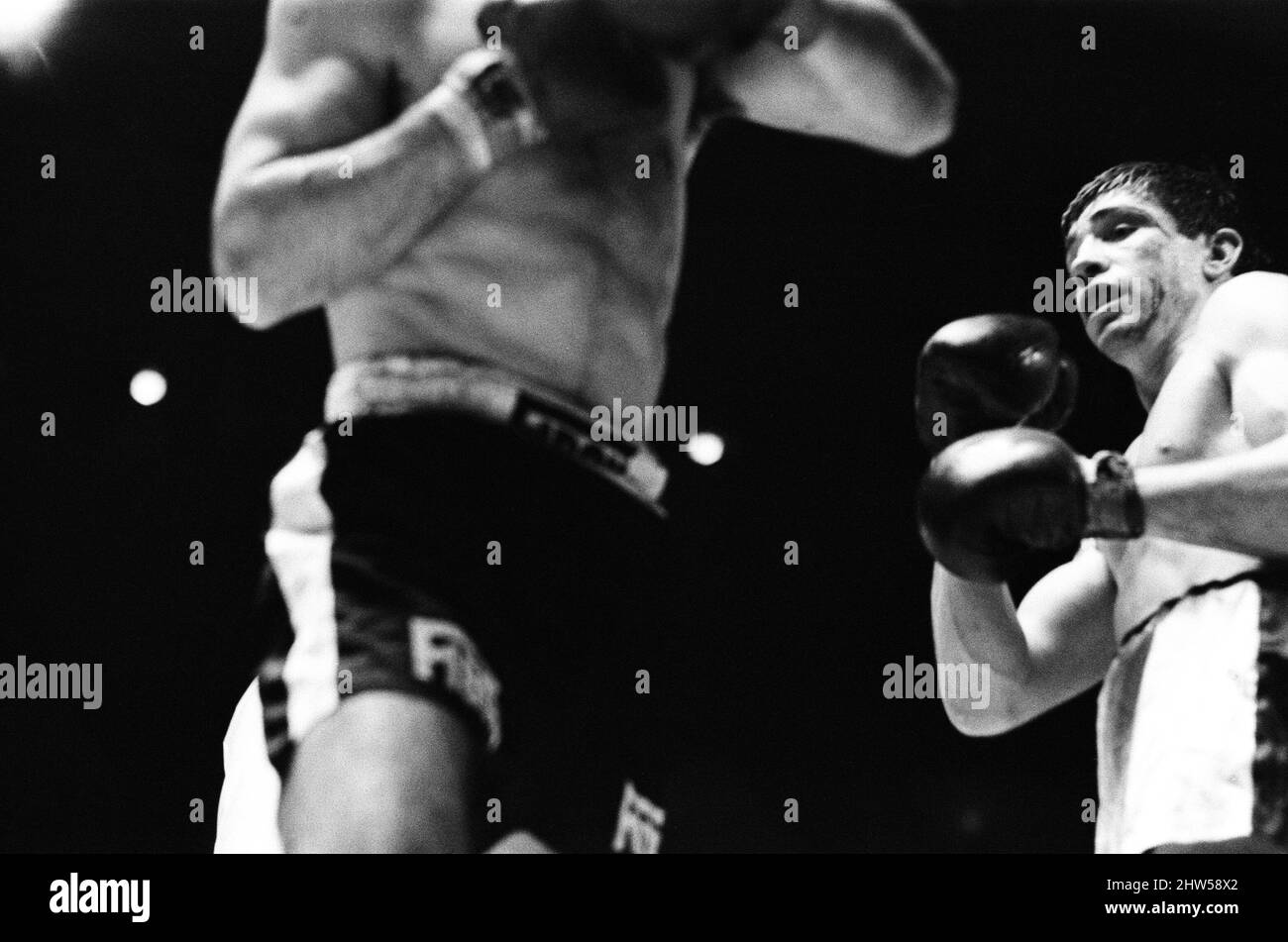 Boxing match between Jimmy Tibbs (white shorts) v Franco Macchia, held ...
