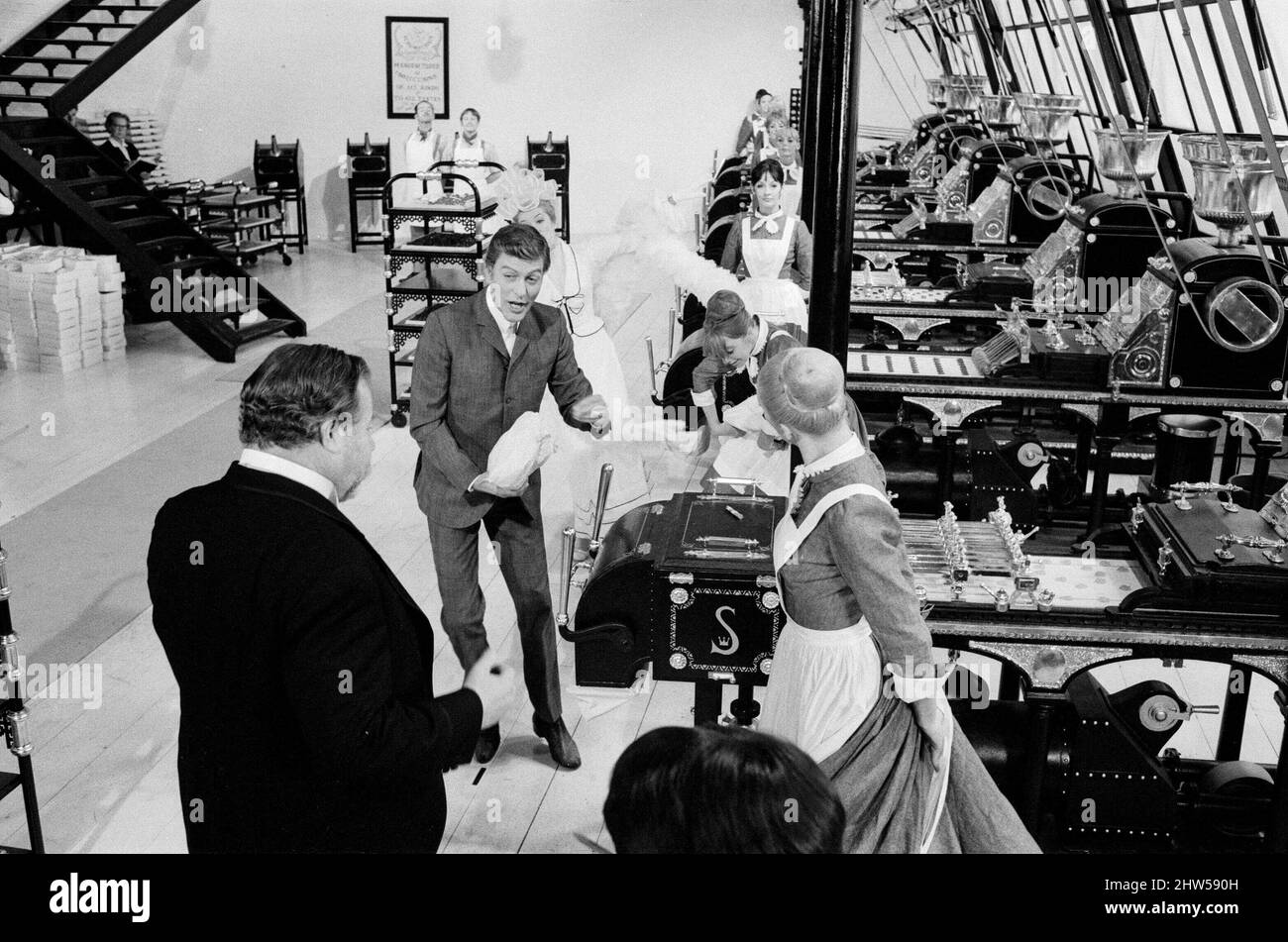 Dick Van Dyke (centre) and James Robertson Justice (right in black ...