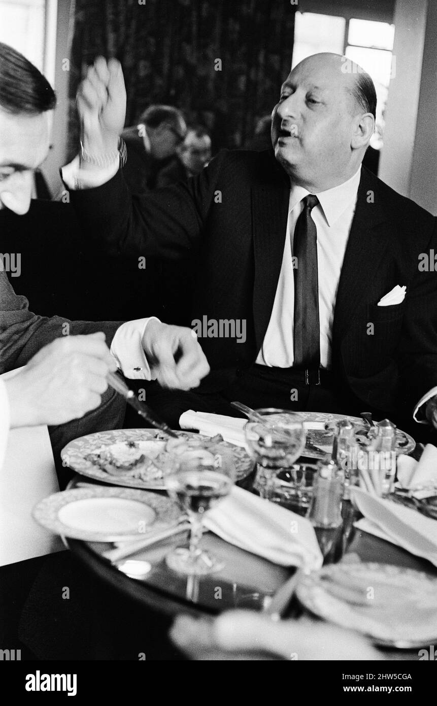 Media Mogul Lord Lew Grade seated at the table at a dinner party. 24th ...