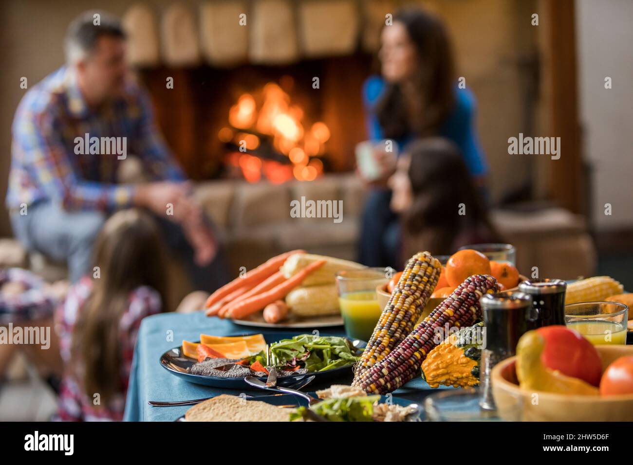 Sitting by fireplace hi-res stock photography and images - Alamy
