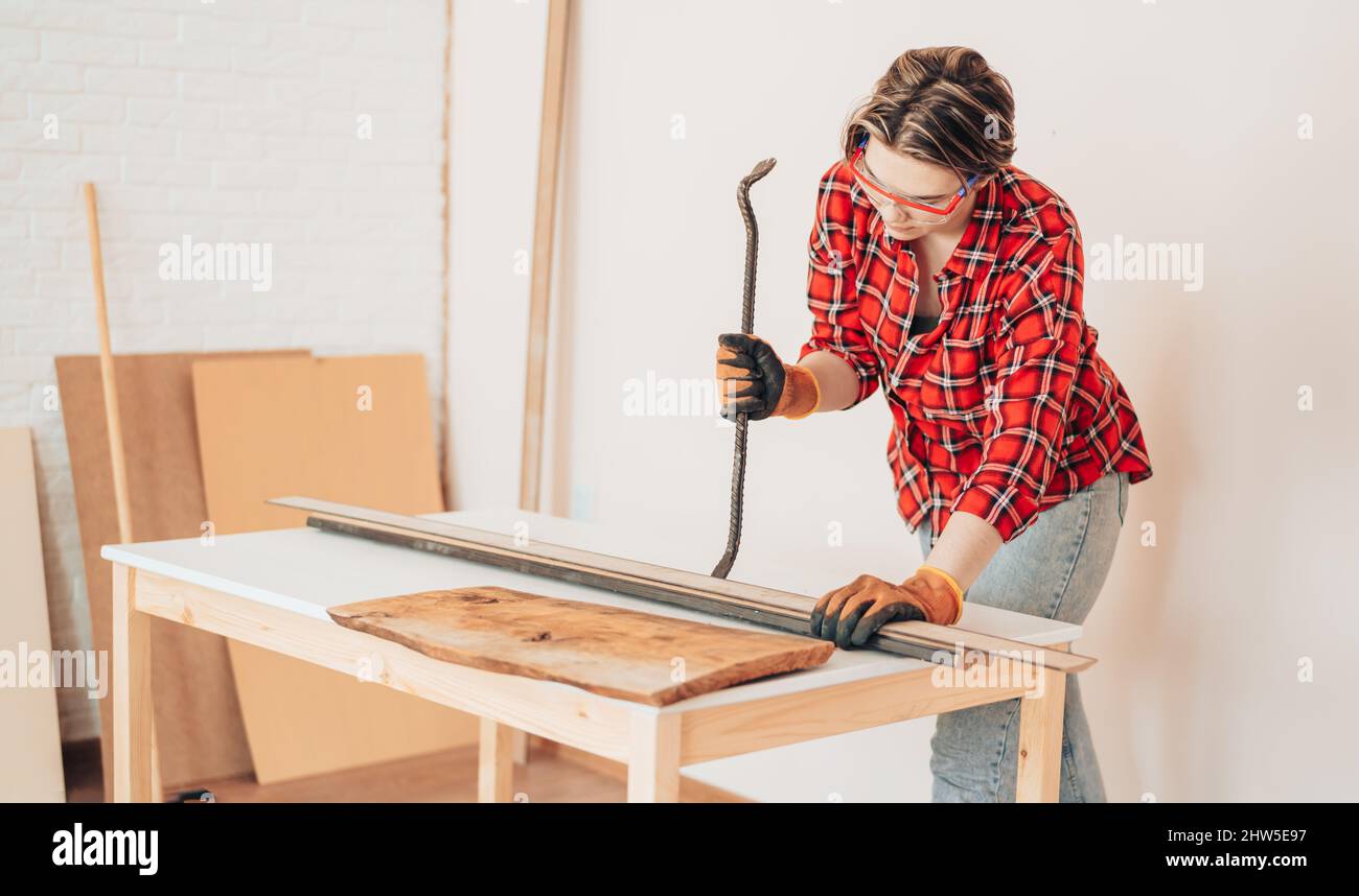 Girl with crowbar hi-res stock photography and images - Alamy
