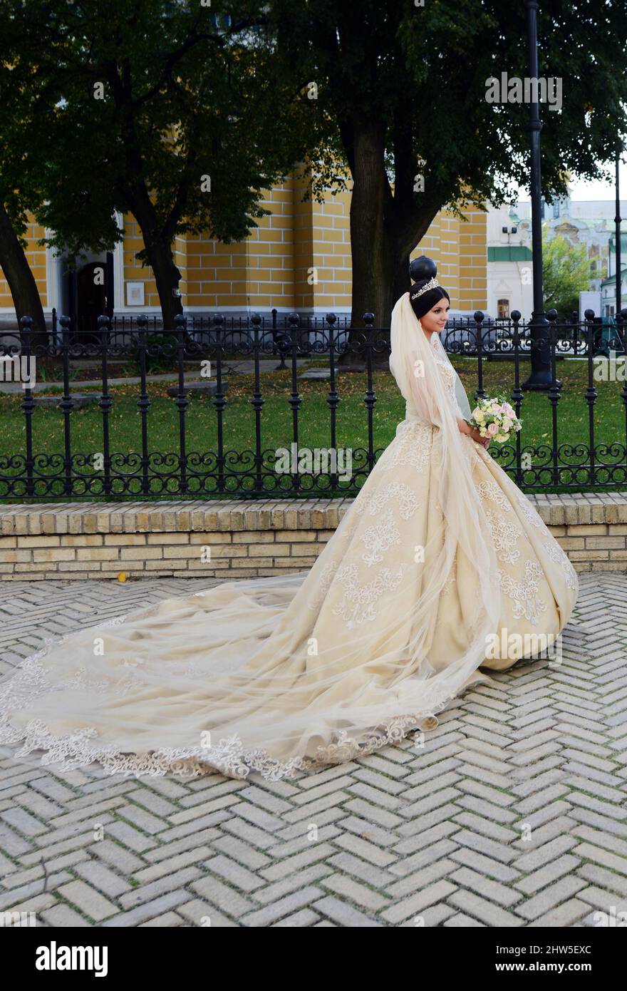A Ukrainian bride in a photoshoot at the Lavra monastery in Kyiv ...