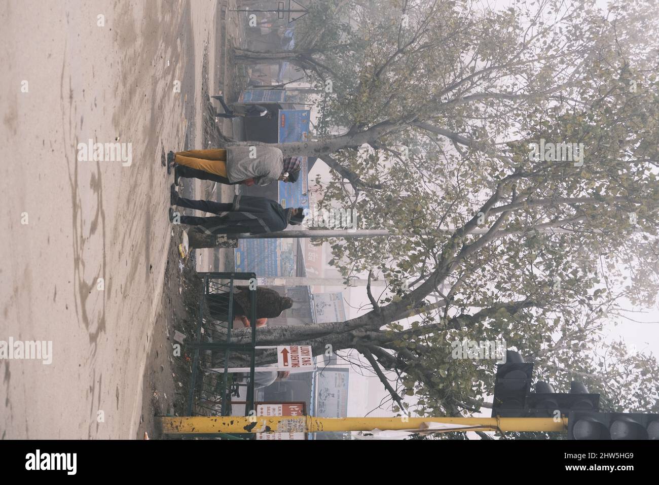 Group of Indian people standing and talking outside on a street Stock ...