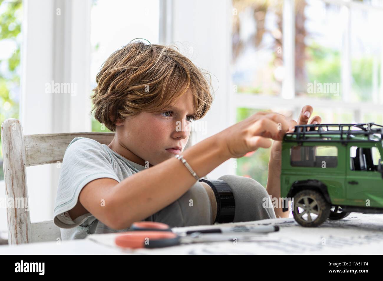 Building toy model boy hi-res stock photography and images - Alamy