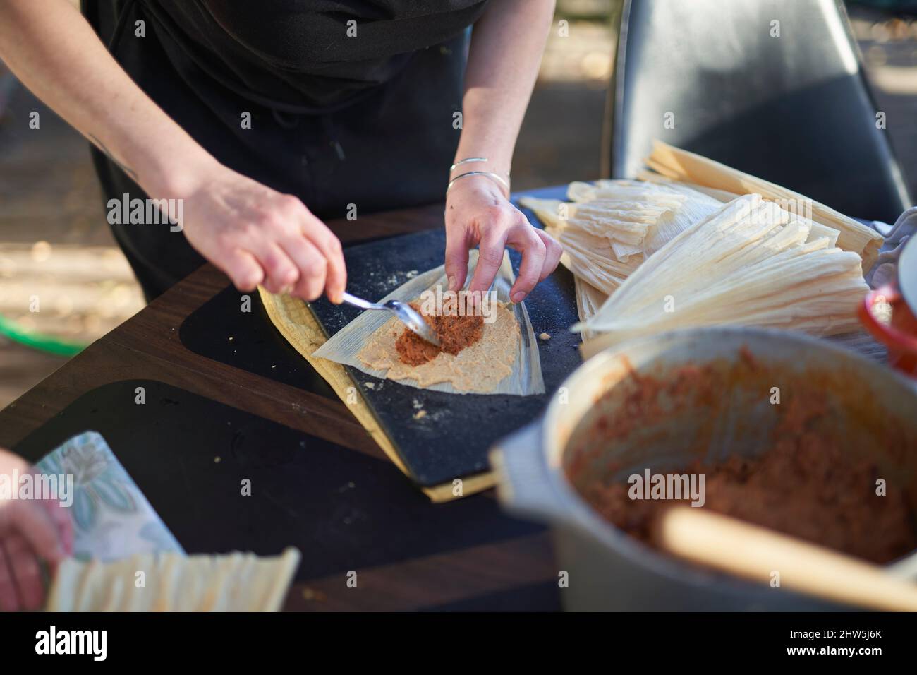 Person preparing tamales, close up Stock Photo - Alamy