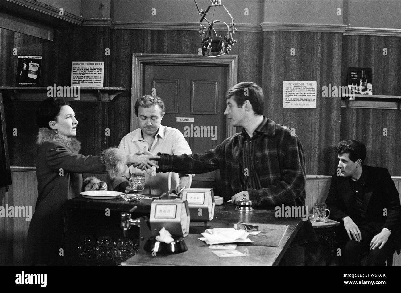 The cast of 'Coronation Street' on set. Eileen Derbyshire behind the ...