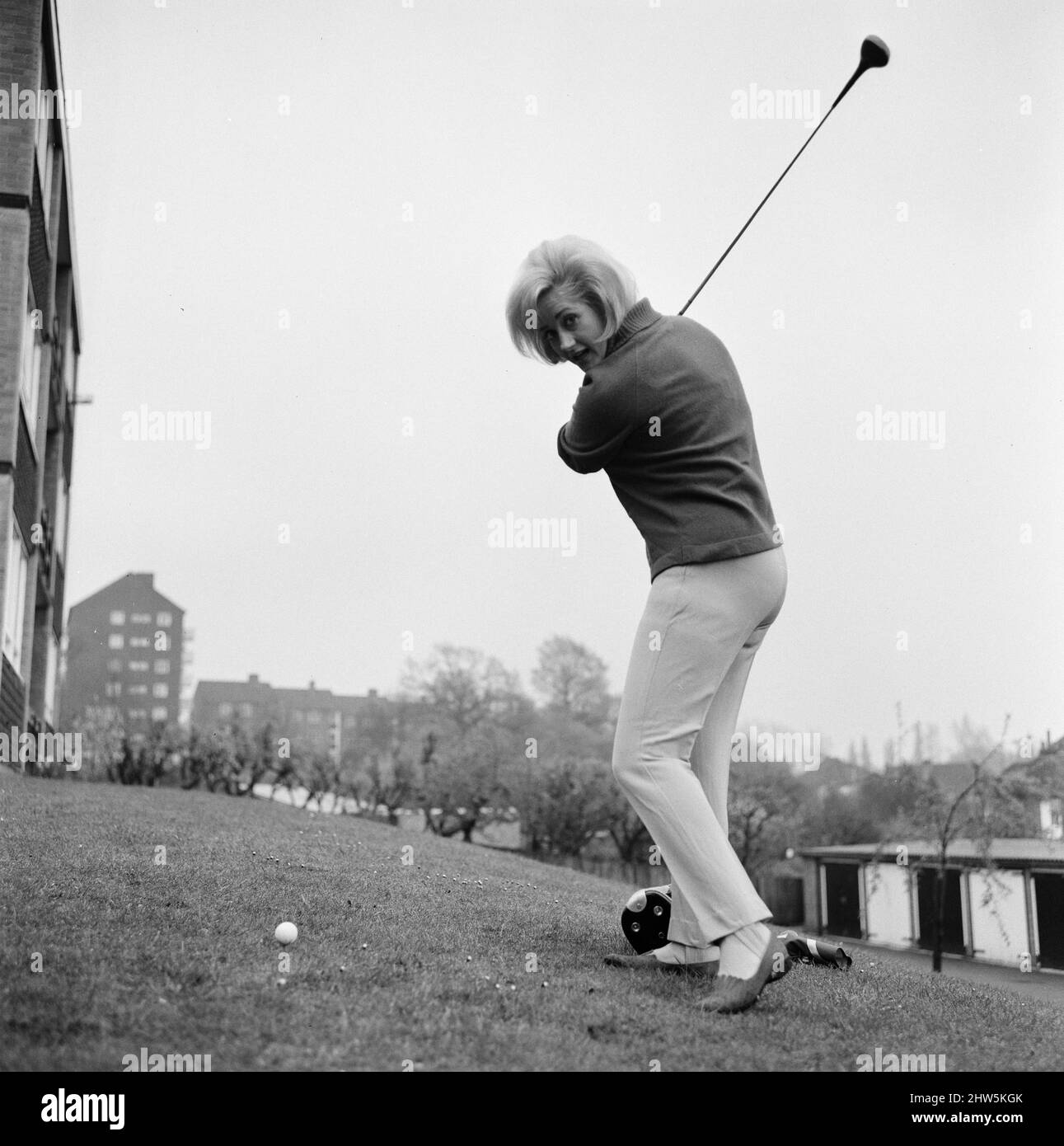 Liz Fraser, English actress, practices her golf swing, April 1967 Stock ...