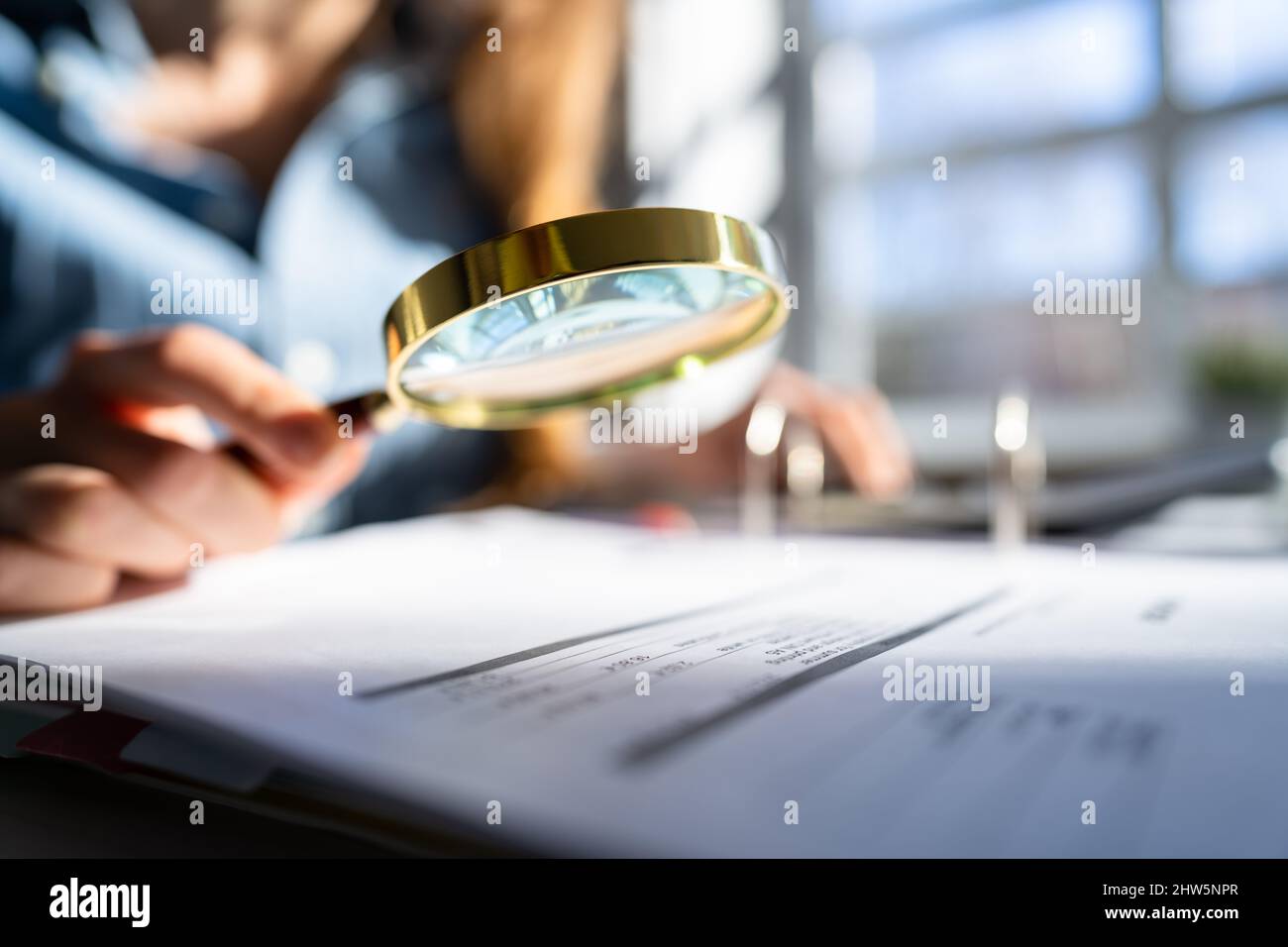 Auditor Using Magnifying Glass For Audit And Fraud Investigation Stock ...