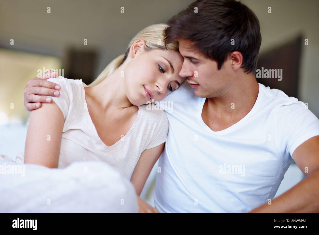 Young husband comforted wife hi-res stock photography and images - Alamy