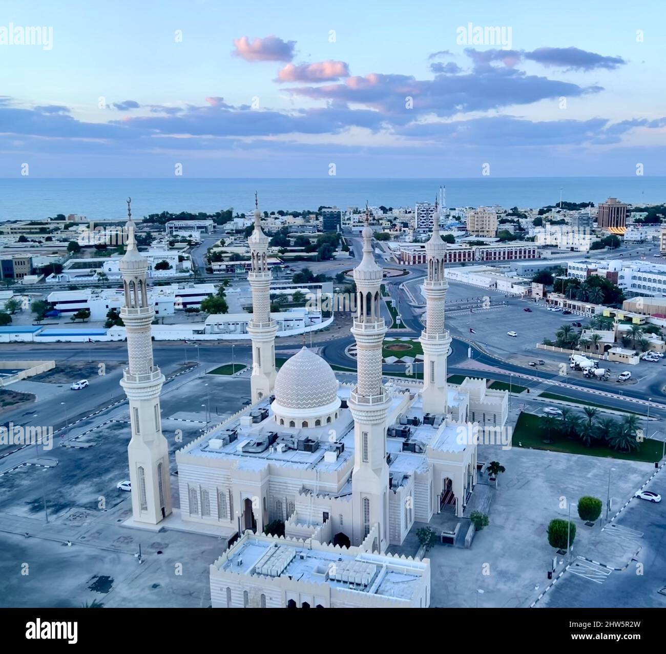 Aerial view of the Sheikh Zayed Grand Mosque under a cloudy sky during ...