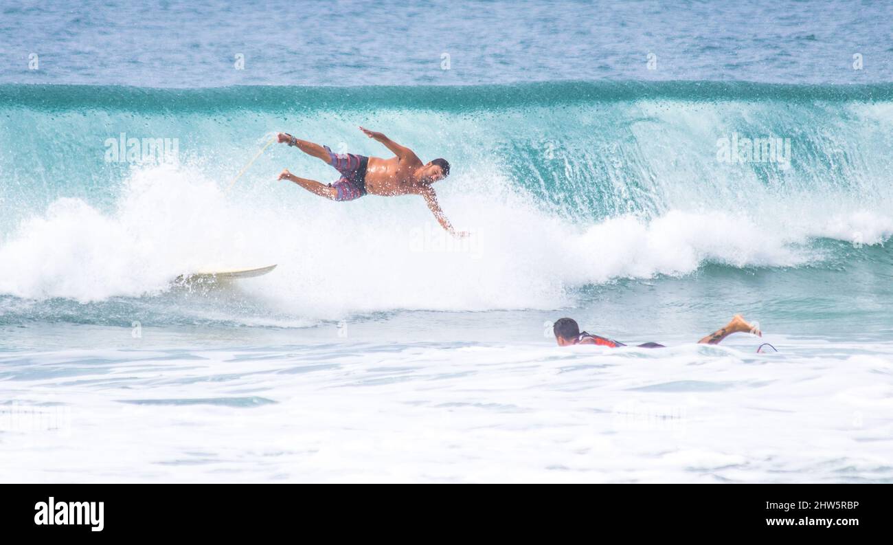 Surfer falling off surfboard hi-res stock photography and images - Alamy