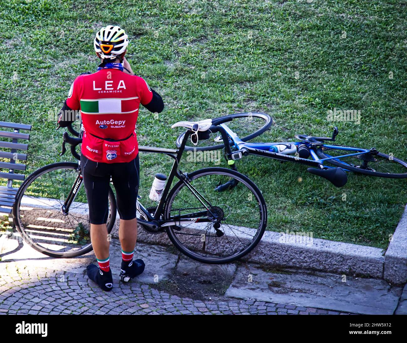 Cyclist resting in the park of the Sanctuary of San Luca. Bologna ...