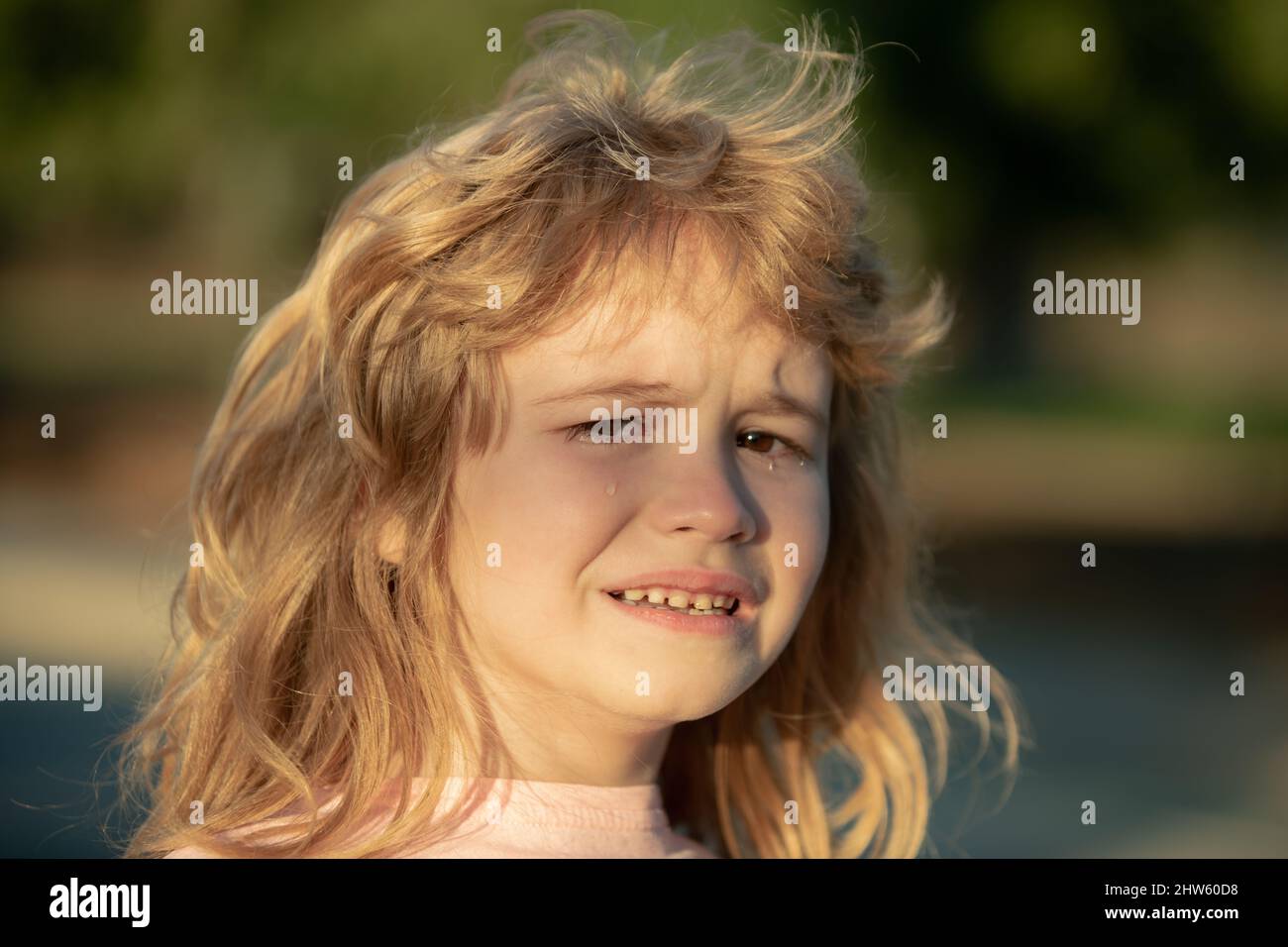 Closeup face of child boy crying outdoor. Kids cry. Boy cries of ...