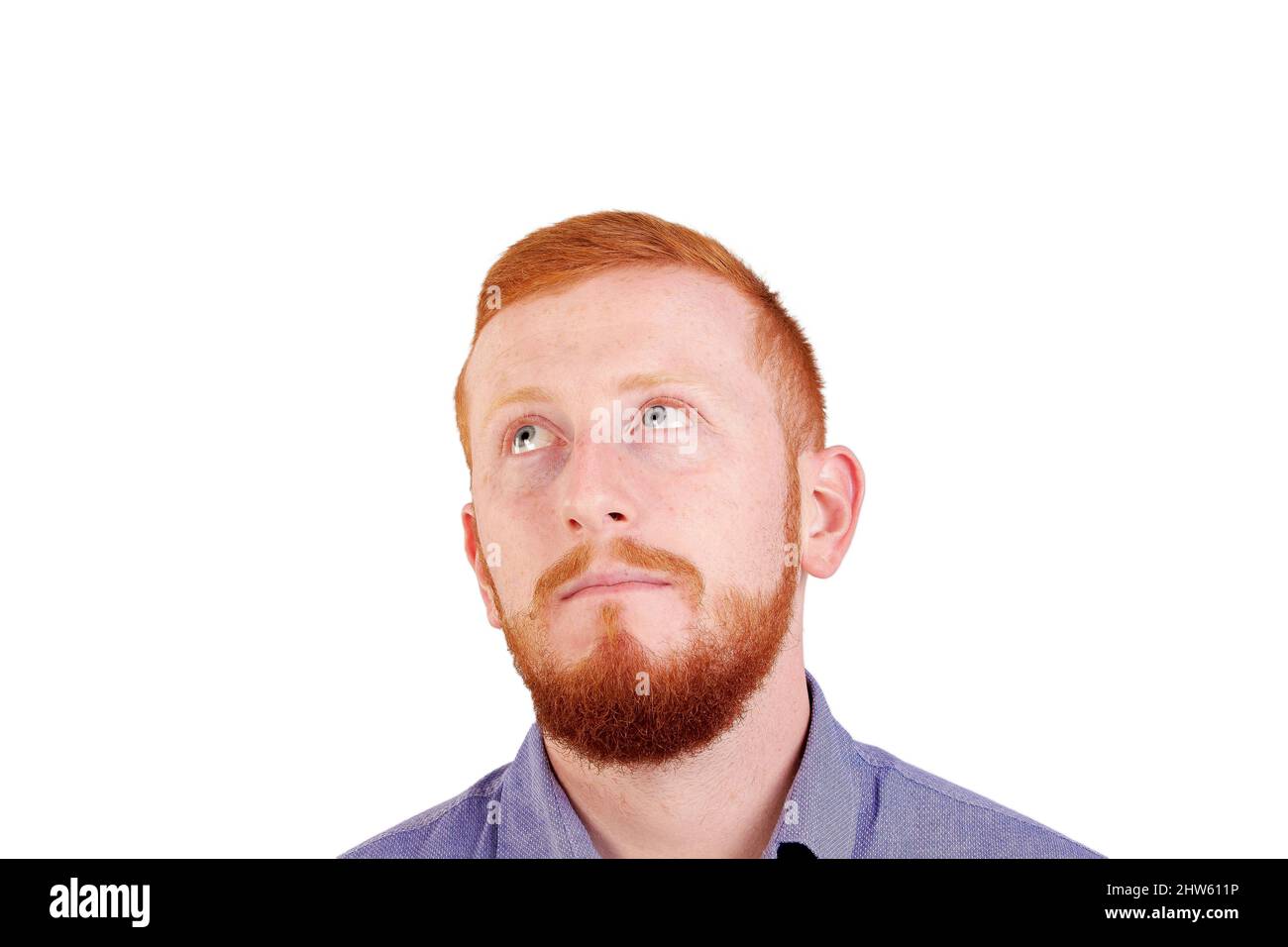 Thinking of something good. Portrait of redhead man with facial ...