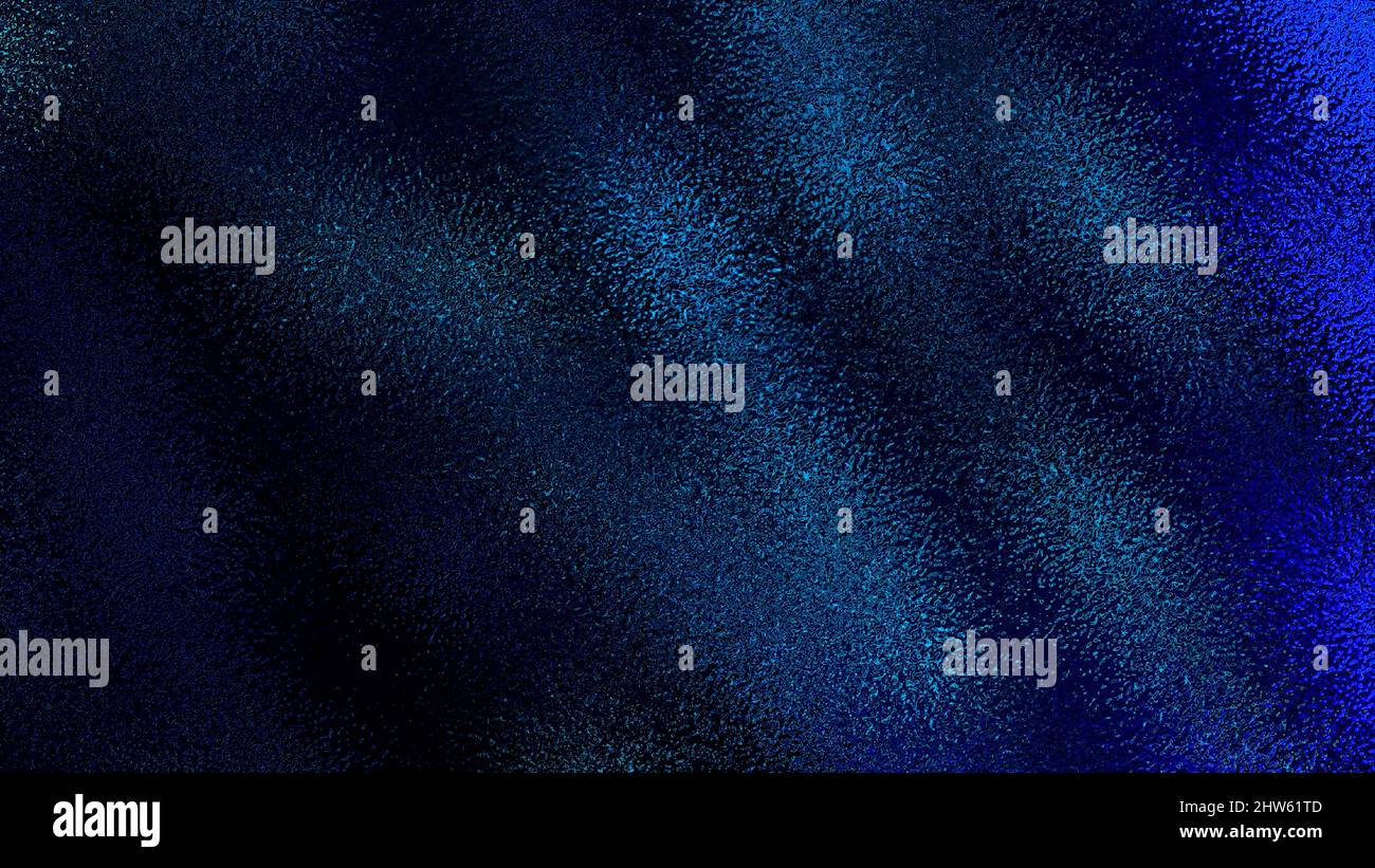 Abstract grainy glass texture with blurred light flares behind it ...