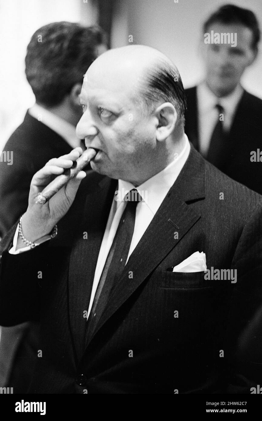 Media Mogul Lord Lew Grade poses for the camera smoking a cigar. 24th ...