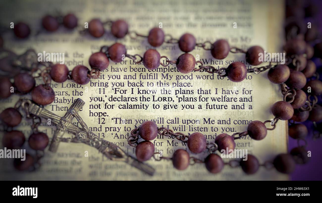 Top view of Bible verses with blurred Holy Rosary Background Stock ...