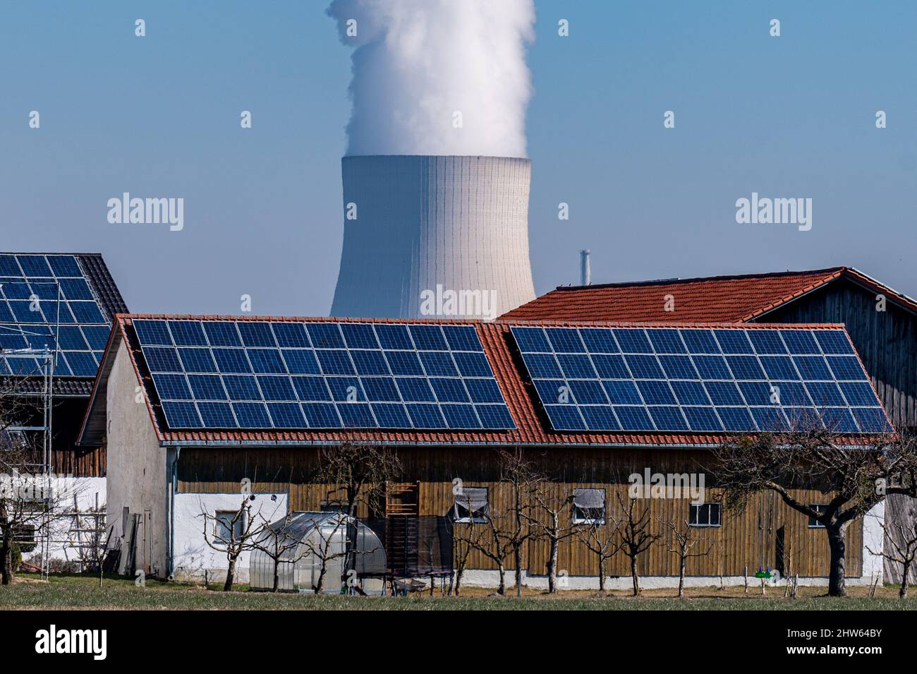 Essenbach, Germany. 03rd Mar, 2022. Steam rises from the cooling tower of the Isar 2 nuclear ...