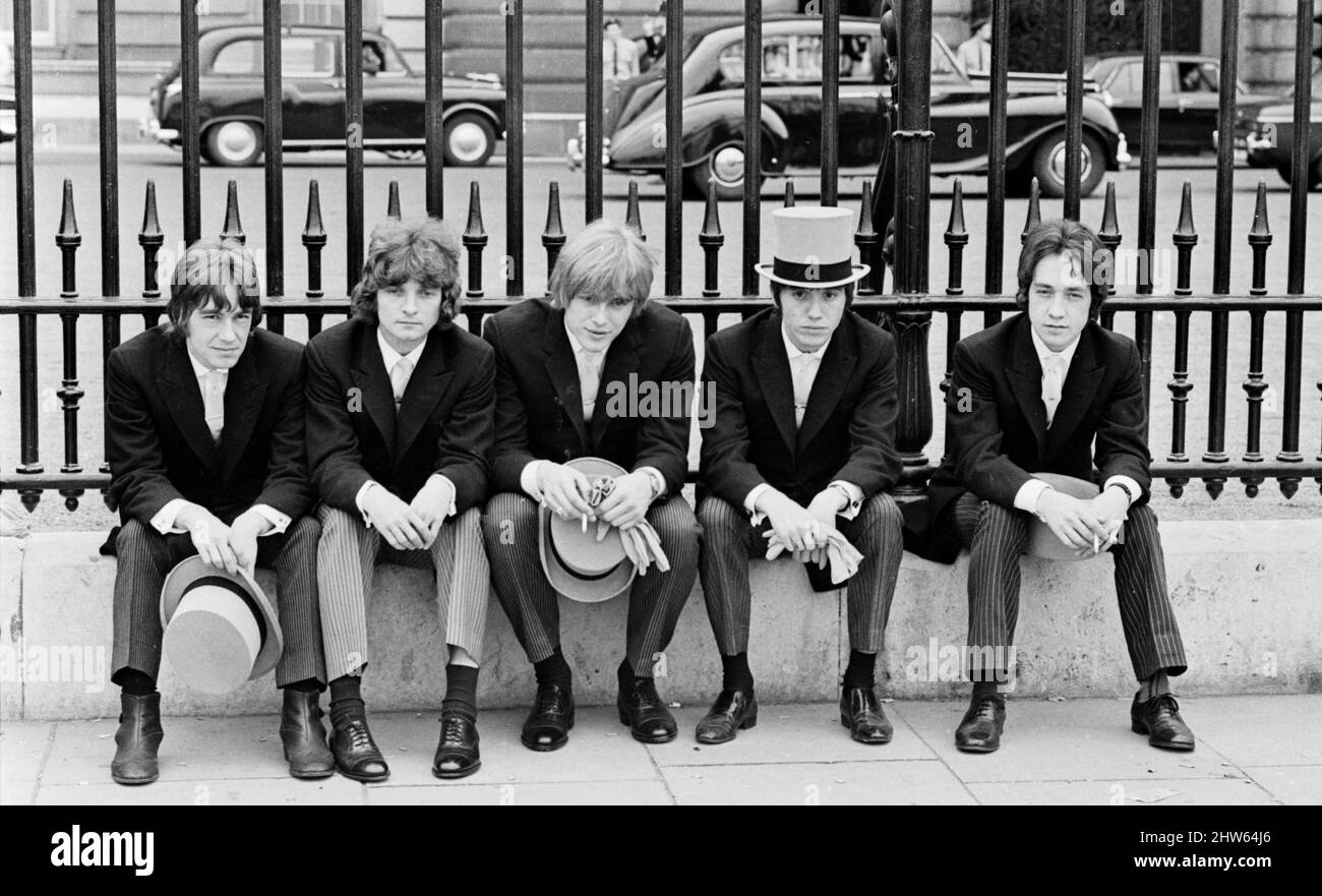 Pop group 'The Easy Beats' outside Buckingham Palace after being ...