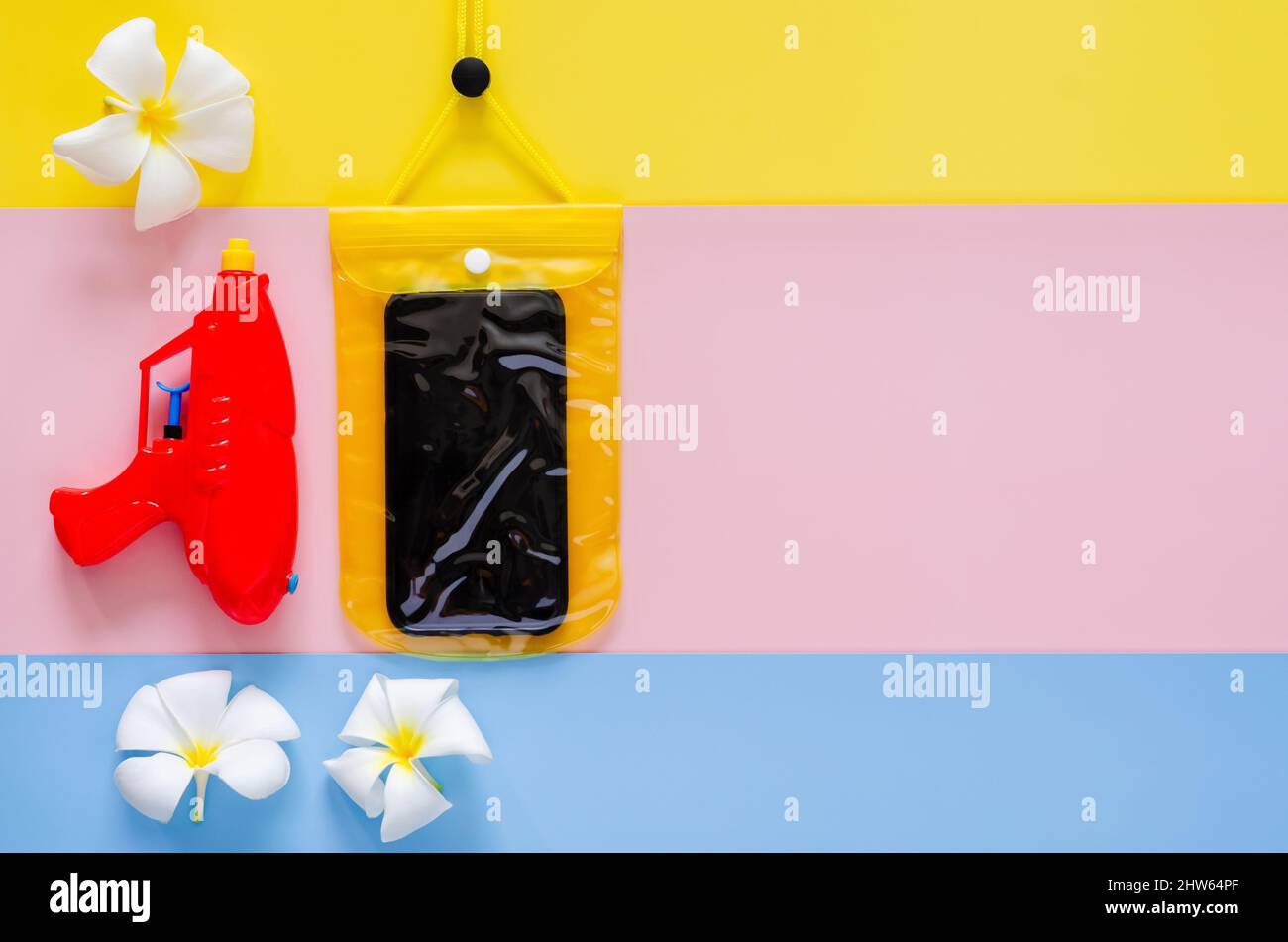 Waterproof case for smartphone and water gun which are accessories of ...