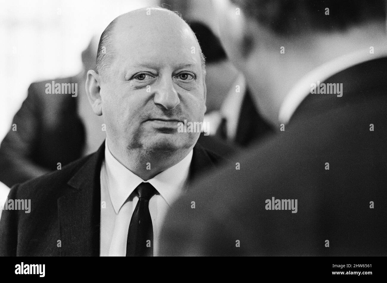 Media Mogul Lord Lew Grade speaking to a guest at a dinner party. 24th ...