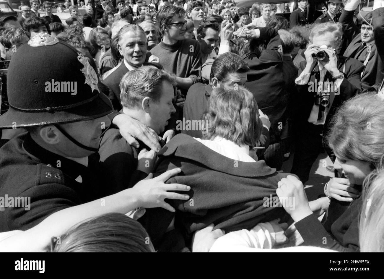 Crowds throng around Mick Jagger and Keith Richards on 10 May 1967 ...