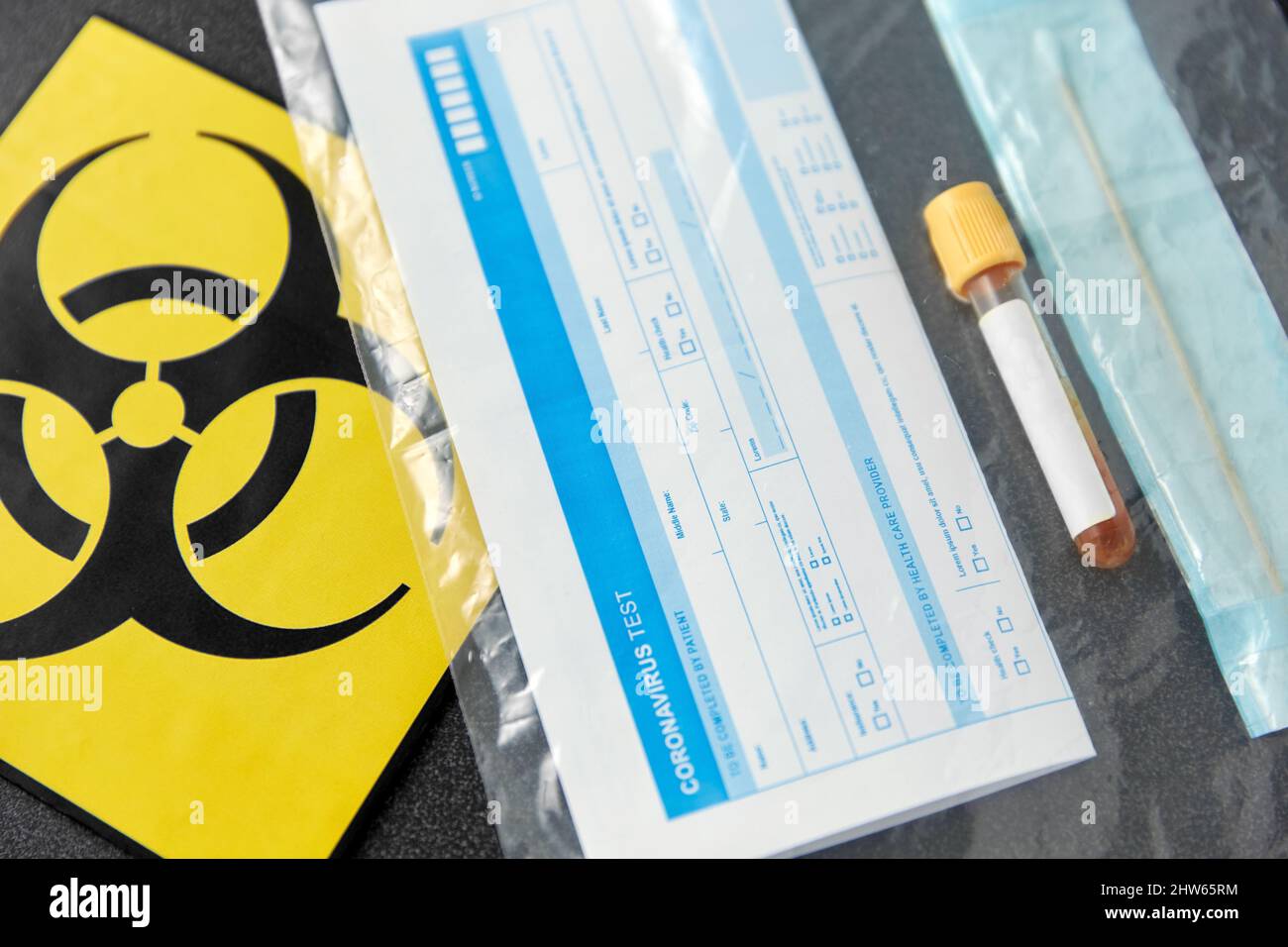 beaker with test, cotton swab and medical report Stock Photo - Alamy