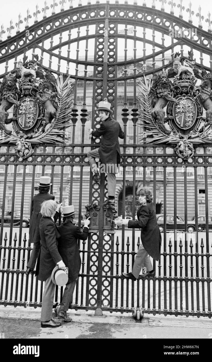 Pop group 'The Easy Beats' outside Buckingham Palace after being ...