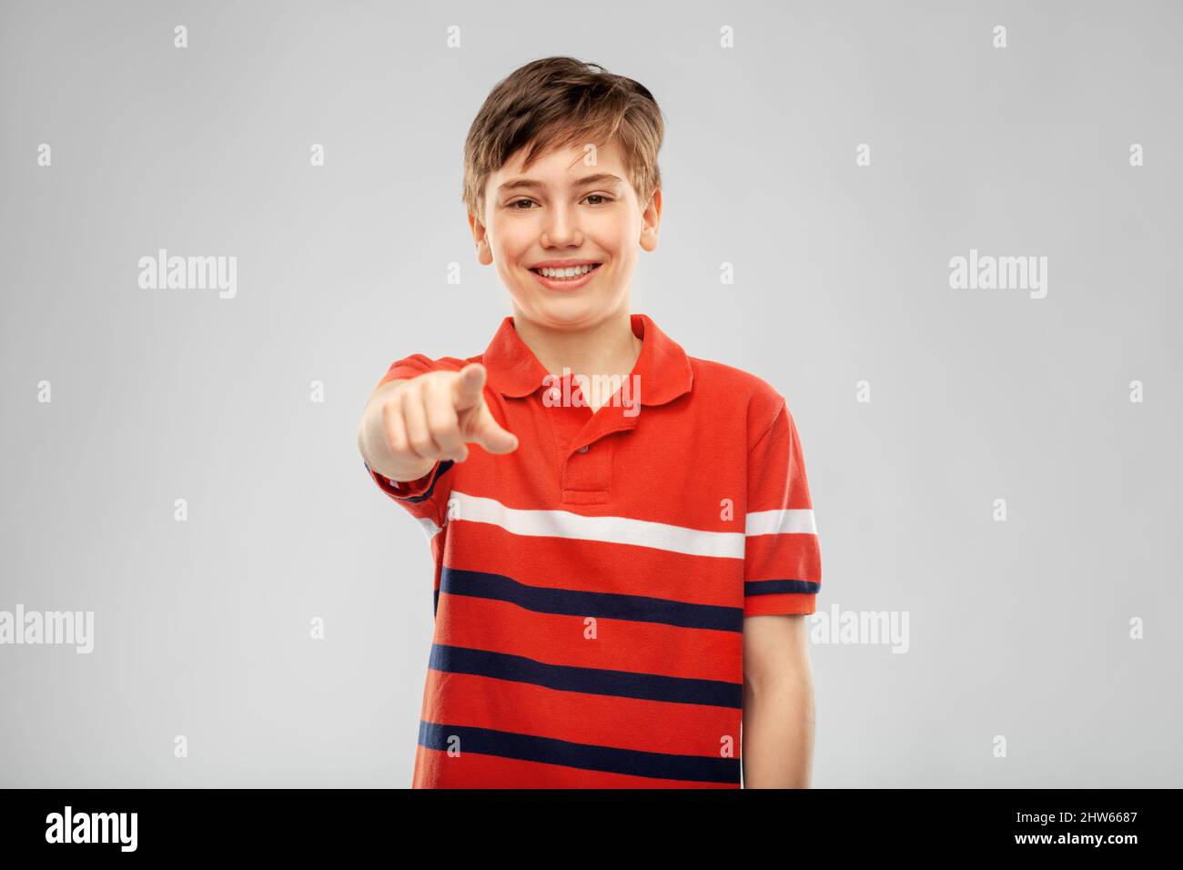 portrait of smiling boy pointing finger to camera Stock Photo - Alamy