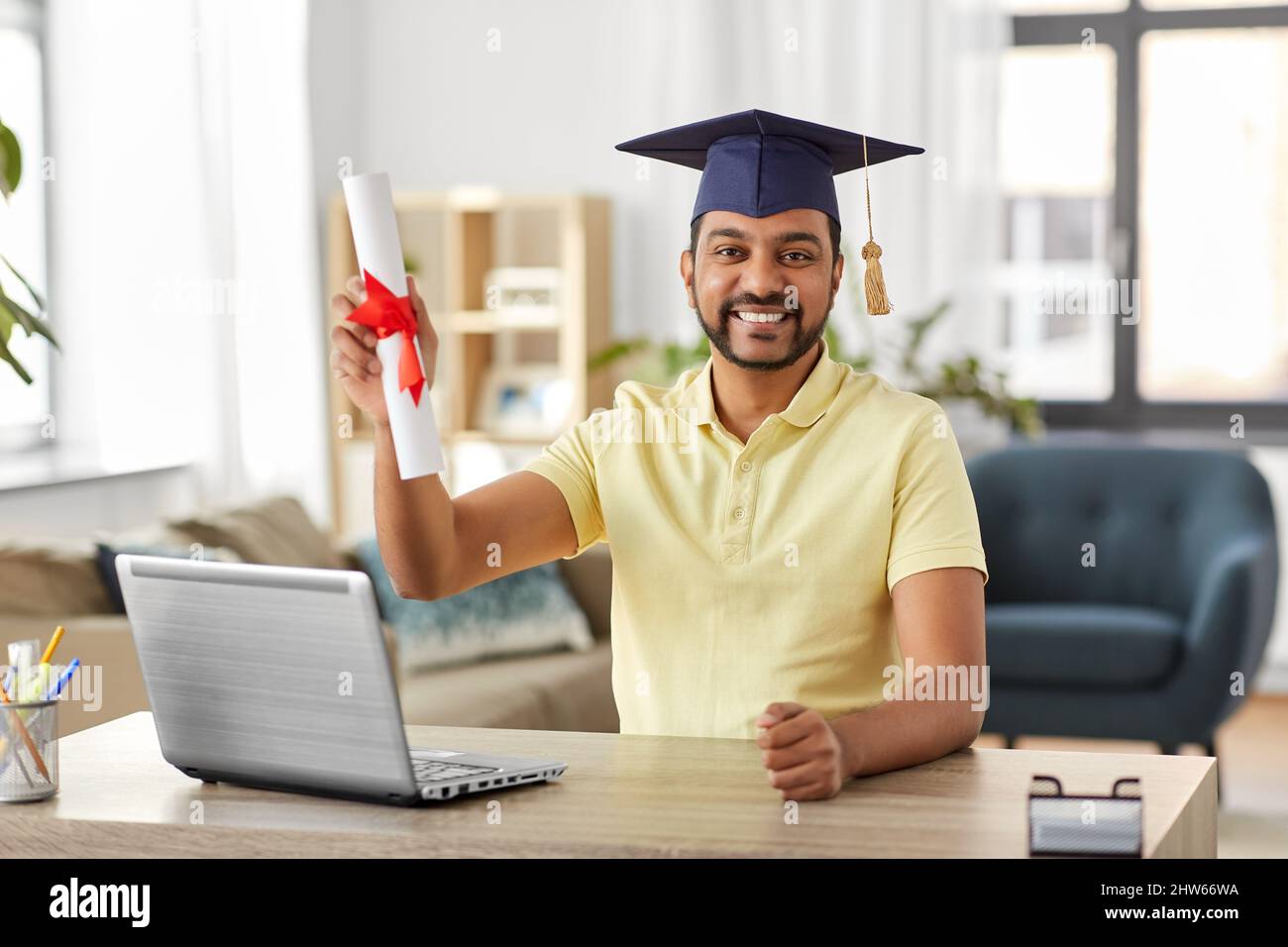 Indian student with laptop hi-res stock photography and images - Alamy