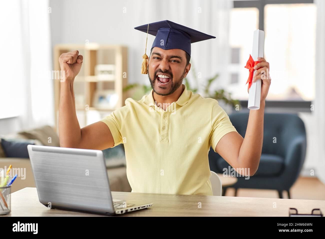 Indian student with laptop hi-res stock photography and images - Alamy