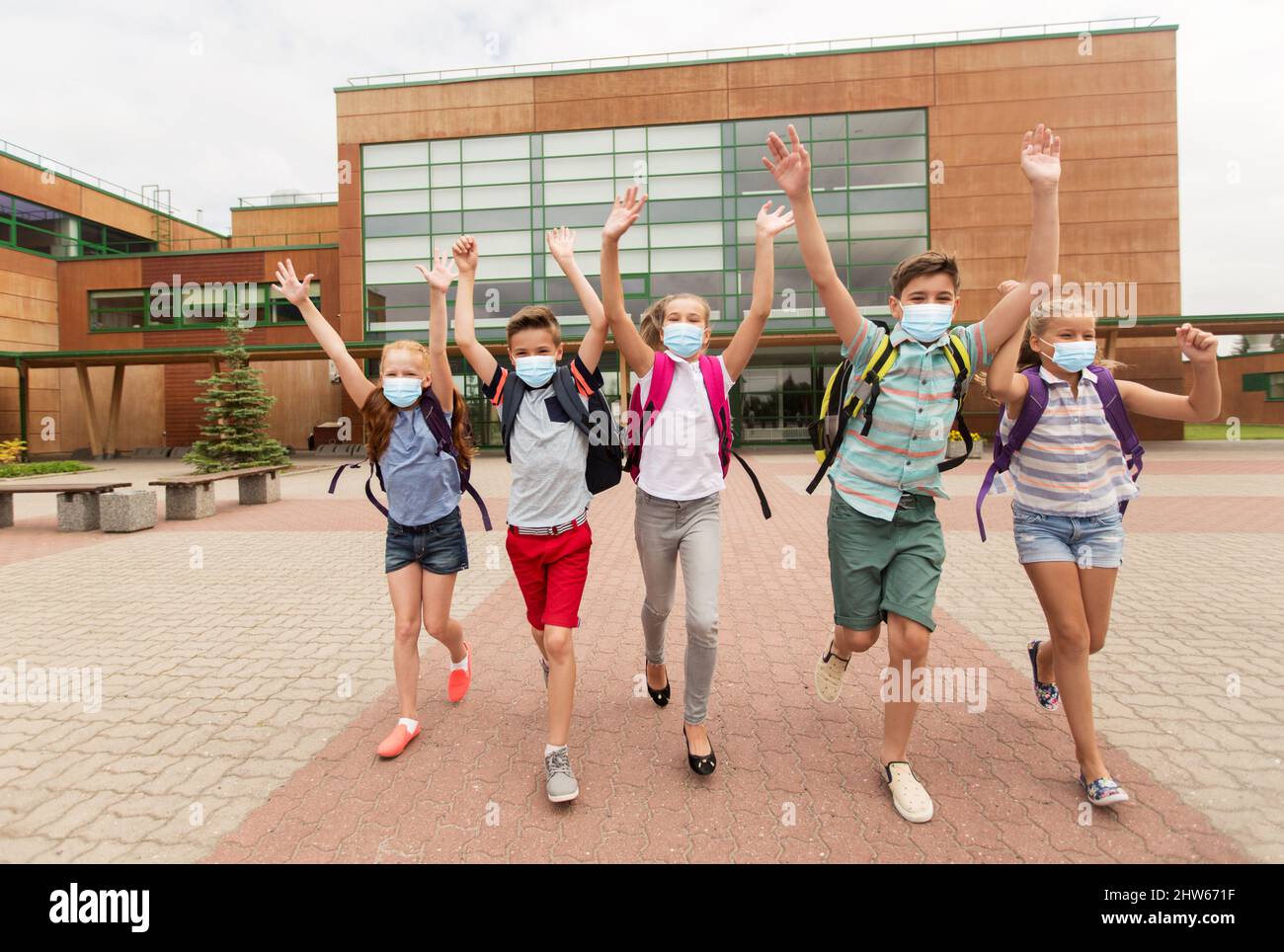 Child leaving school waving hi-res stock photography and images - Alamy