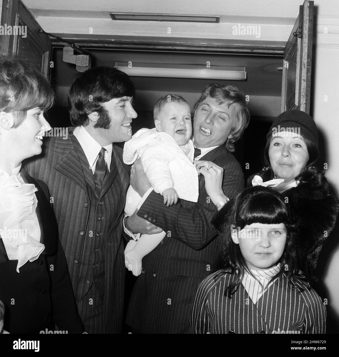 The Christening of six-month-old James Thomas Tarbuck, son of comedian ...