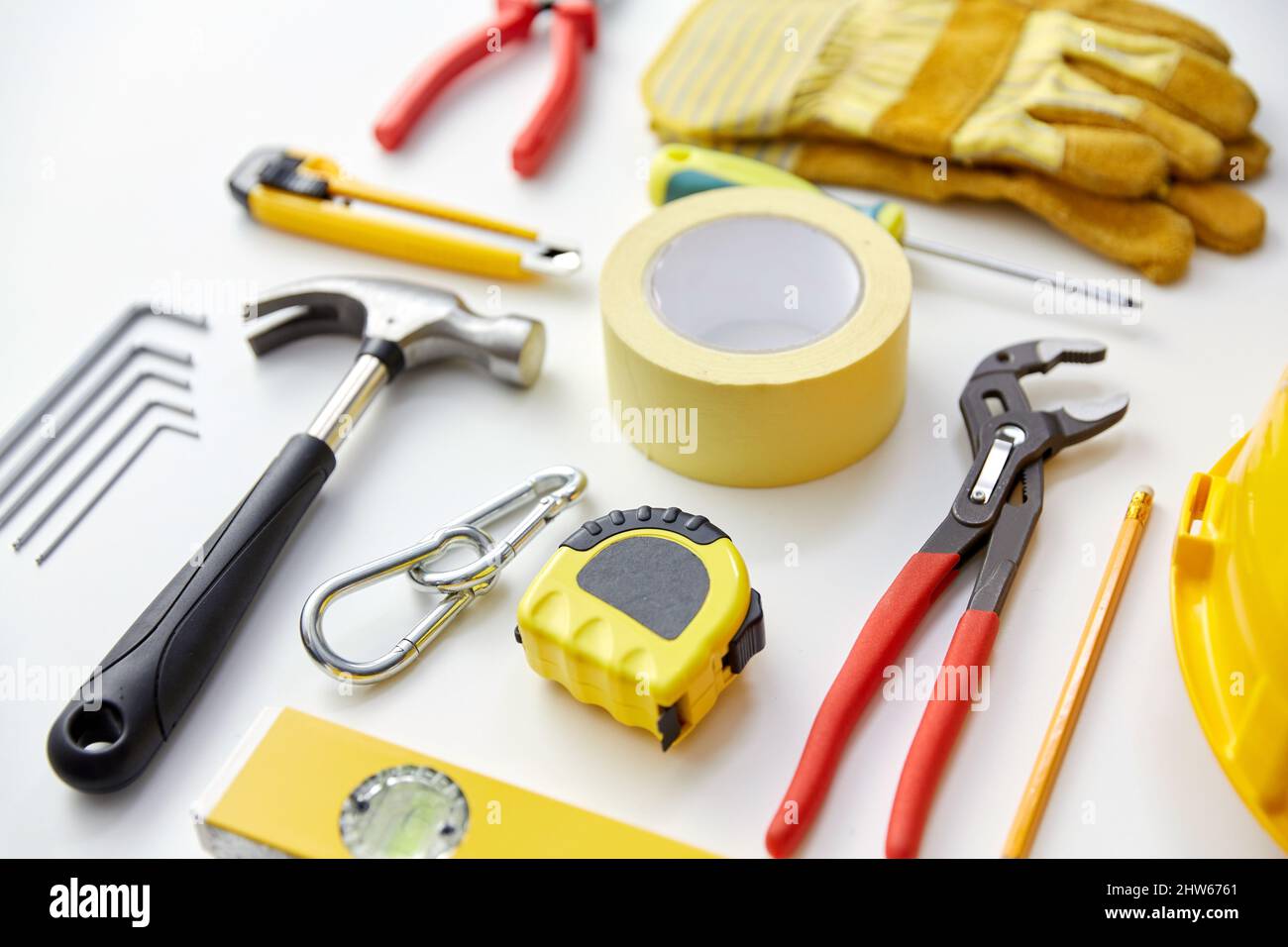 different work tools on white background Stock Photo - Alamy