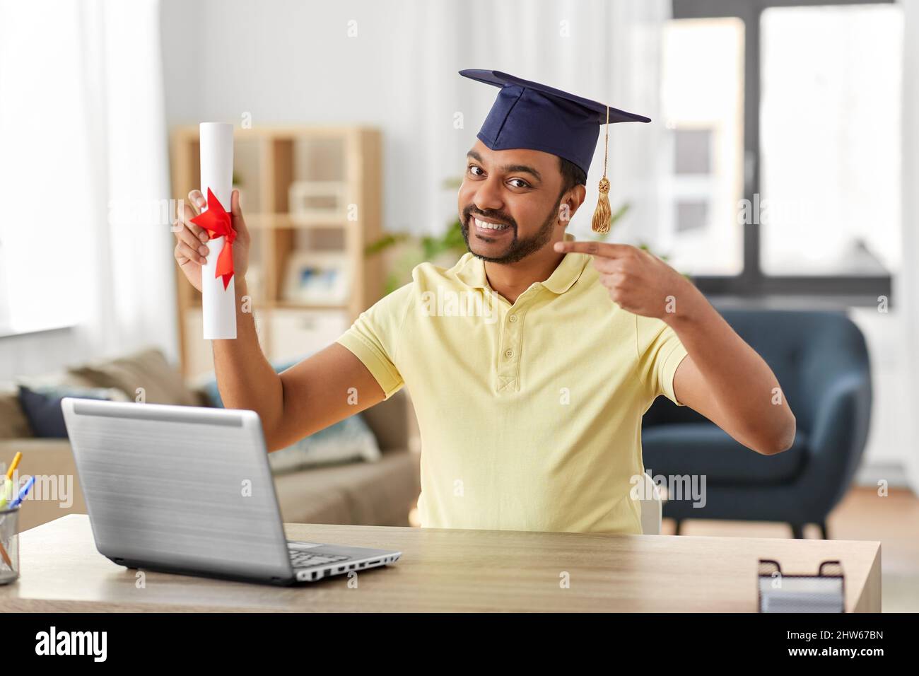 Indian student with laptop hi-res stock photography and images - Alamy