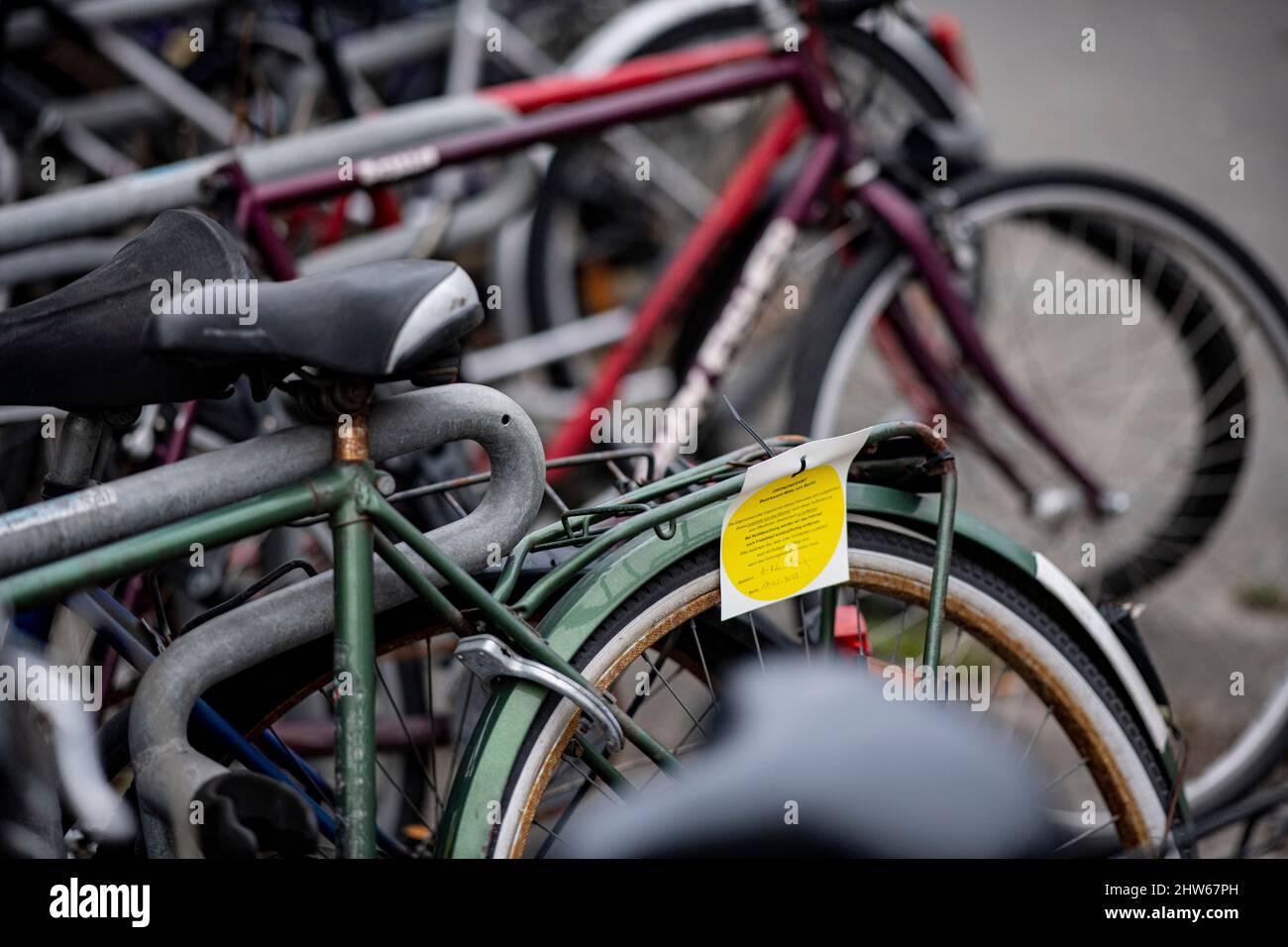 Berlin, Germany. 03rd Mar, 2022. Several scrap bicycles stand at the ...