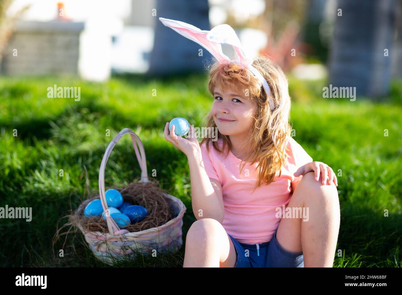 Easter children. Easter bunny child boy with cute face. Kids hunting ...