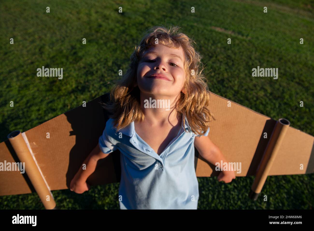 Child playing with toy jetpack. Child pilot astronaut or spaceman ...