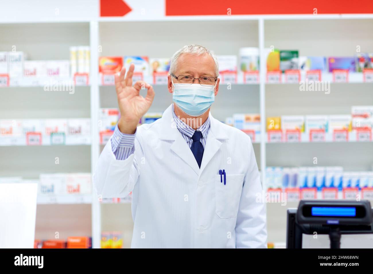Senior apothecary in mask hi-res stock photography and images - Alamy