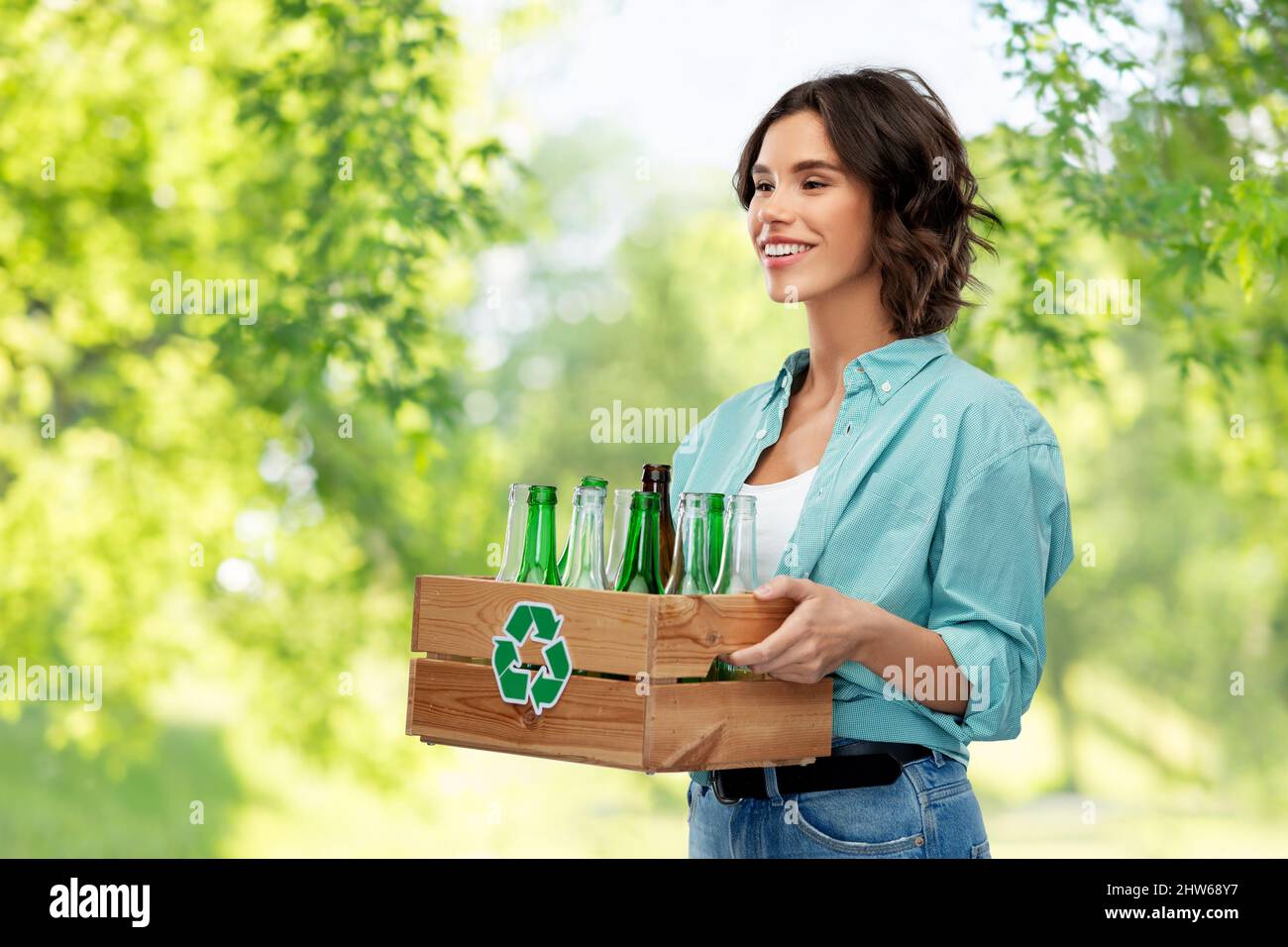 Young woman sorting glass hi-res stock photography and images - Alamy